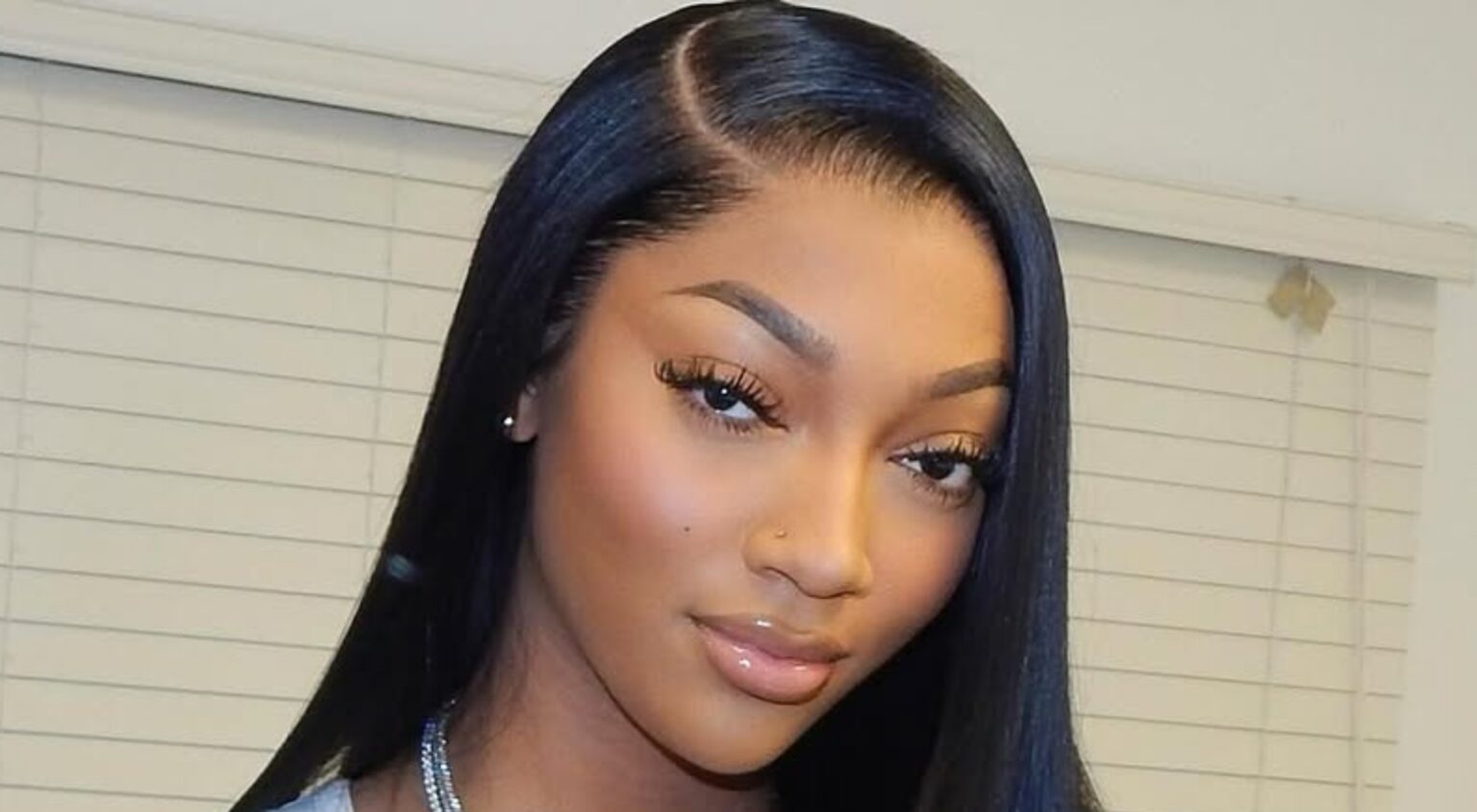 Angel Reese Had Heads Turning In Her Eye-Popping White Tank Top