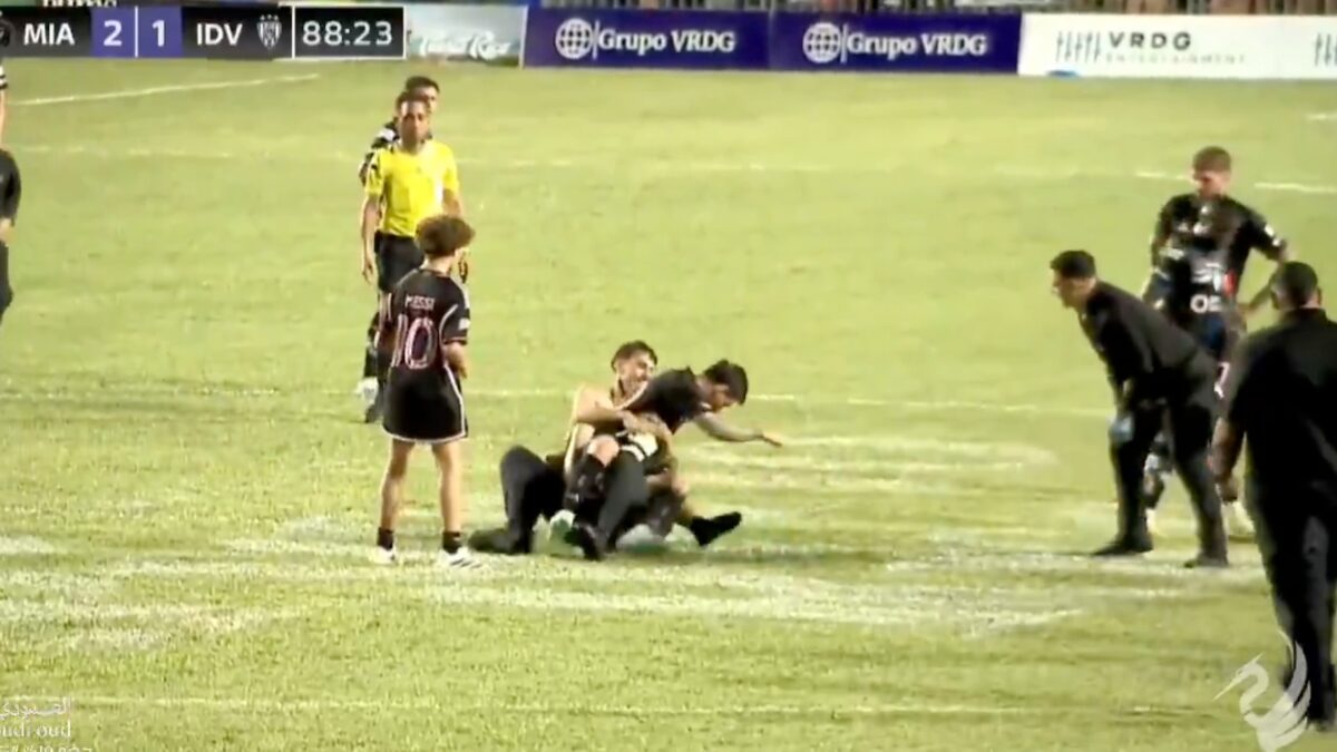 Fans Run Onto The Field & Tackle Lionel Messi During Bizarre Scene At ...