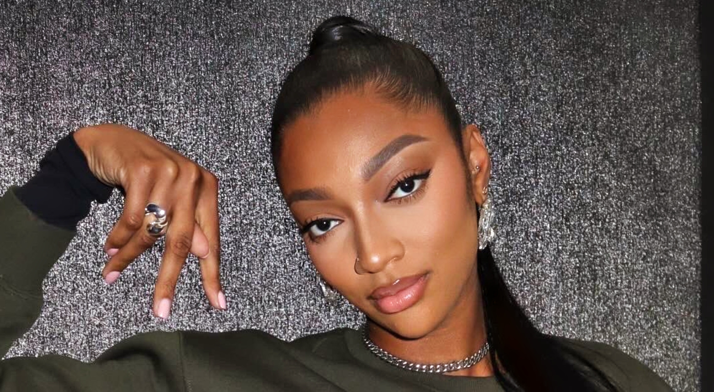Angel Reese Turns Heads With Sultry New Team Drip and Short Shorts [PHOTOS]