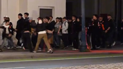 Swarm Of Giants Fans Trash Another Fan After Dodgers Game [VIDEO]