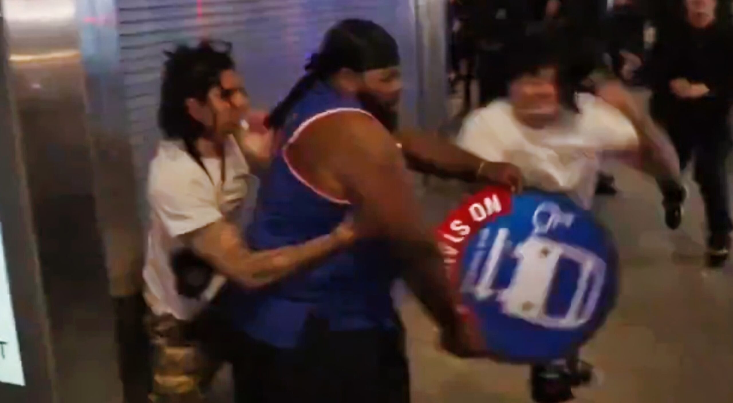 Madness In NYC — Knicks Fan Uses Street Sign As Weapon As Massive Brawl ...
