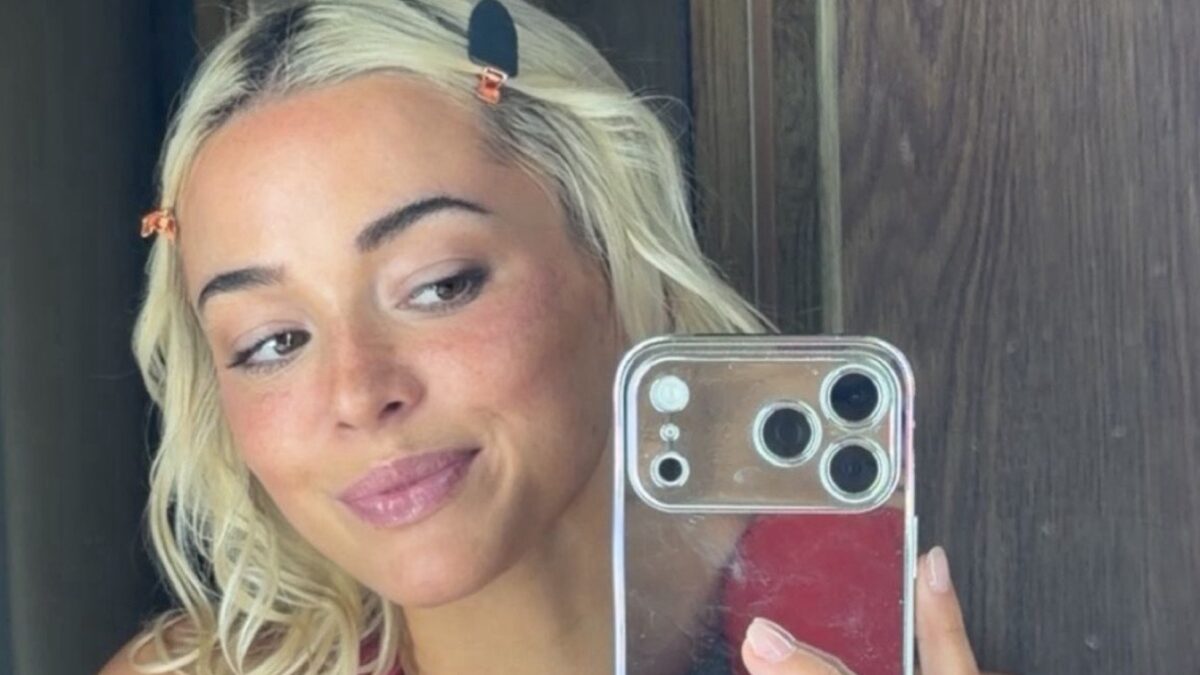 Olivia Dunne Turns Heads In Baywatch-Inspired Red Bodysuit Selfie [PHOTOS]