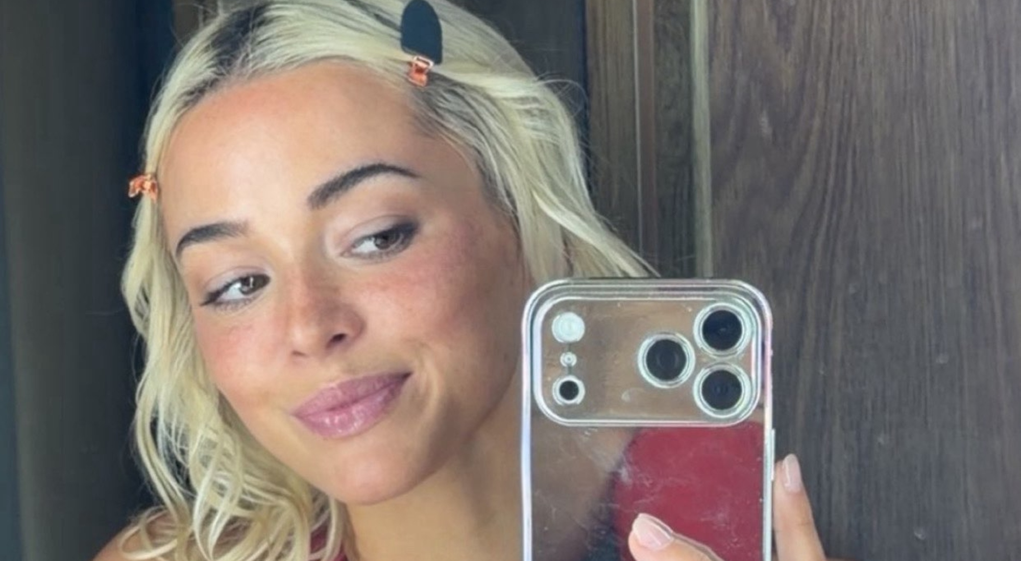 Olivia Dunne Turns Heads In Baywatch-Inspired Red Bodysuit Selfie [PHOTOS]