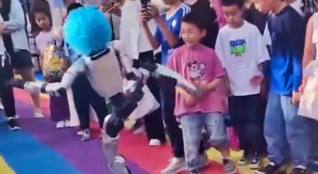 Chinese Robot Wearing Blue Wig Viciously Kicks Young Child In The ...