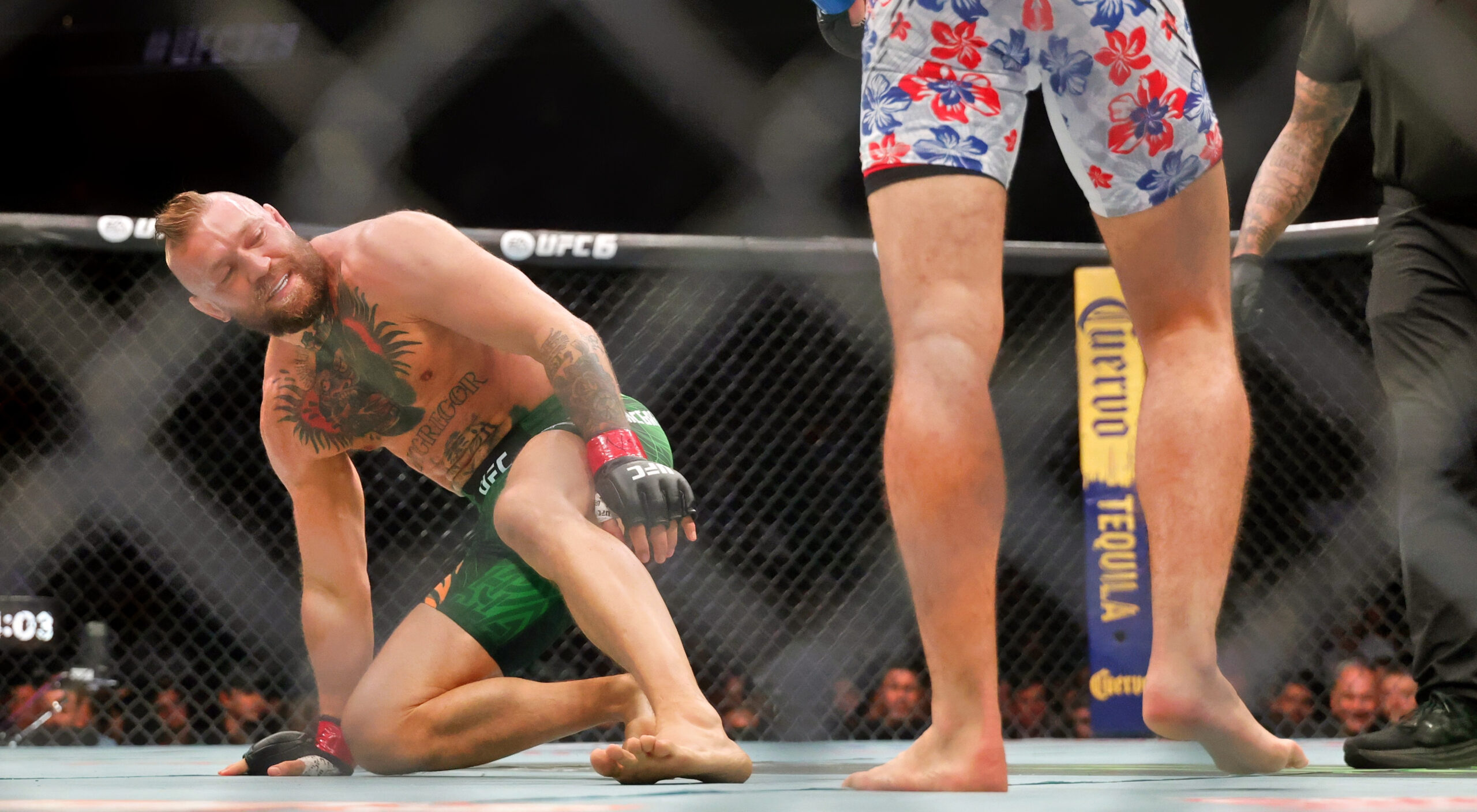 Conor McGregor Knee Injury Ends UFC Return In 69s conor-mcgregor-knee-injury-ends-ufc-return-in-69s